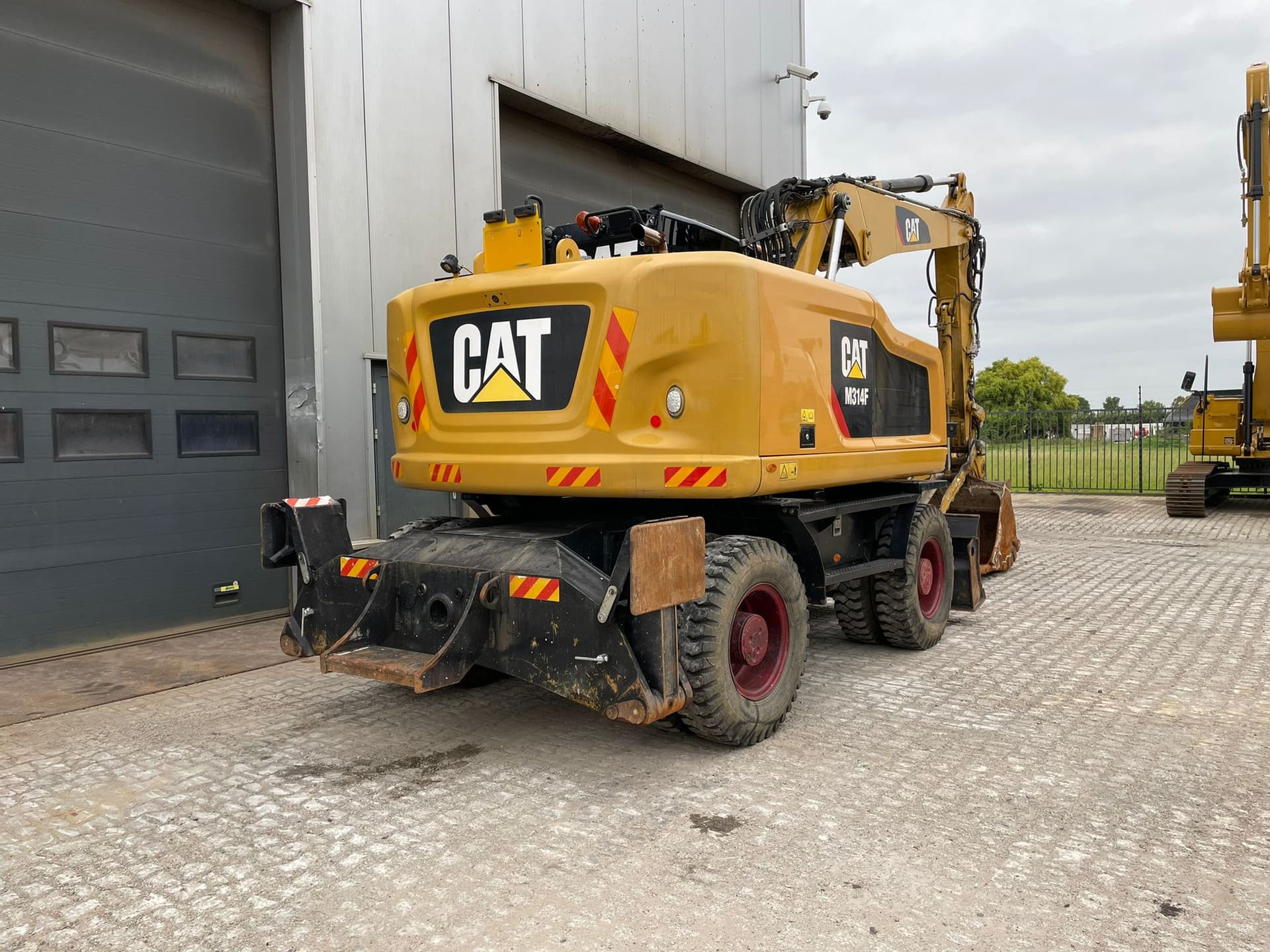 Caterpillar M314F with Outriggers kopen | Gebruikt | Beequip MKB ...
